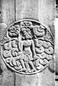 Stūpa 2. Detail: vedika railing, medallion of figure with intertwined ...